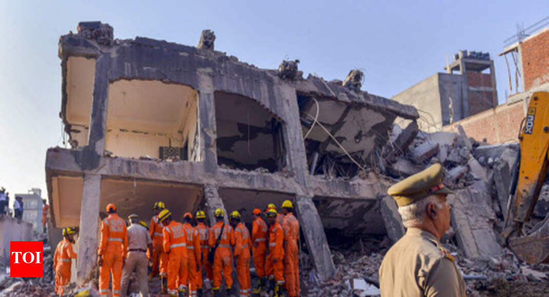In Noida building collapse rubble, 8 found dead, youngest a baby girl ...