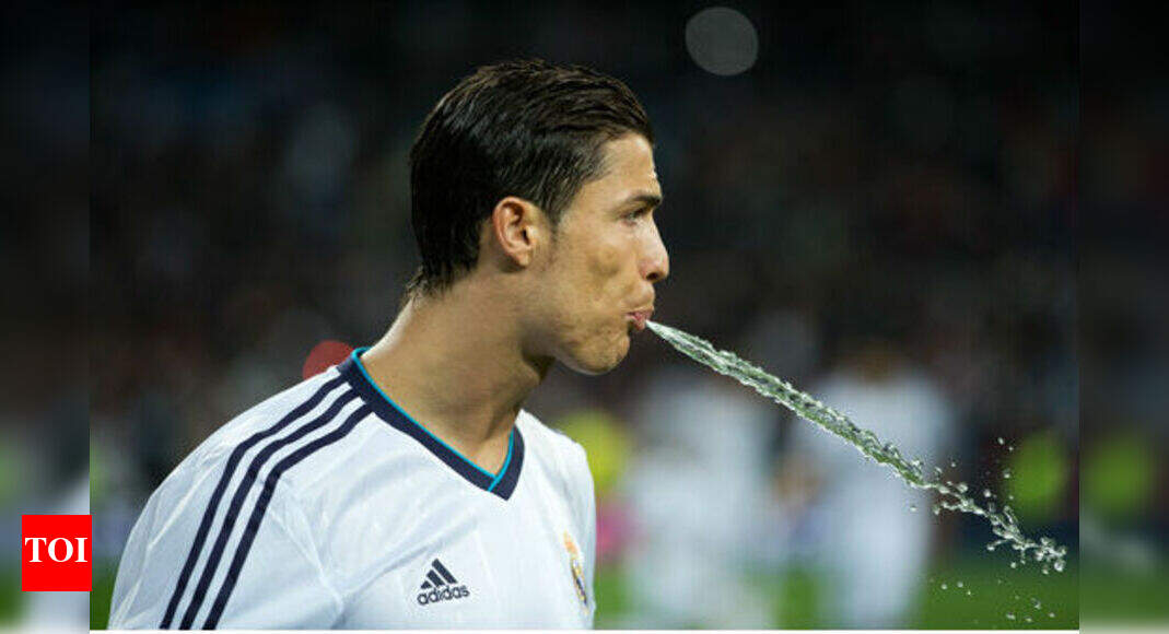 Why are World Cup players and athletes spitting their drinks out ...