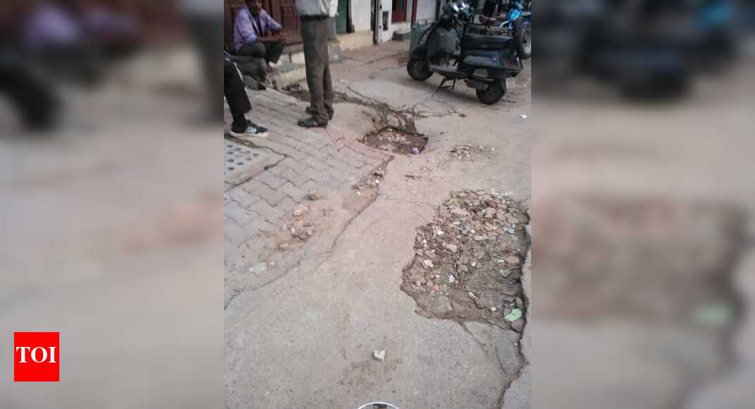 Potholes on the road - Times of India