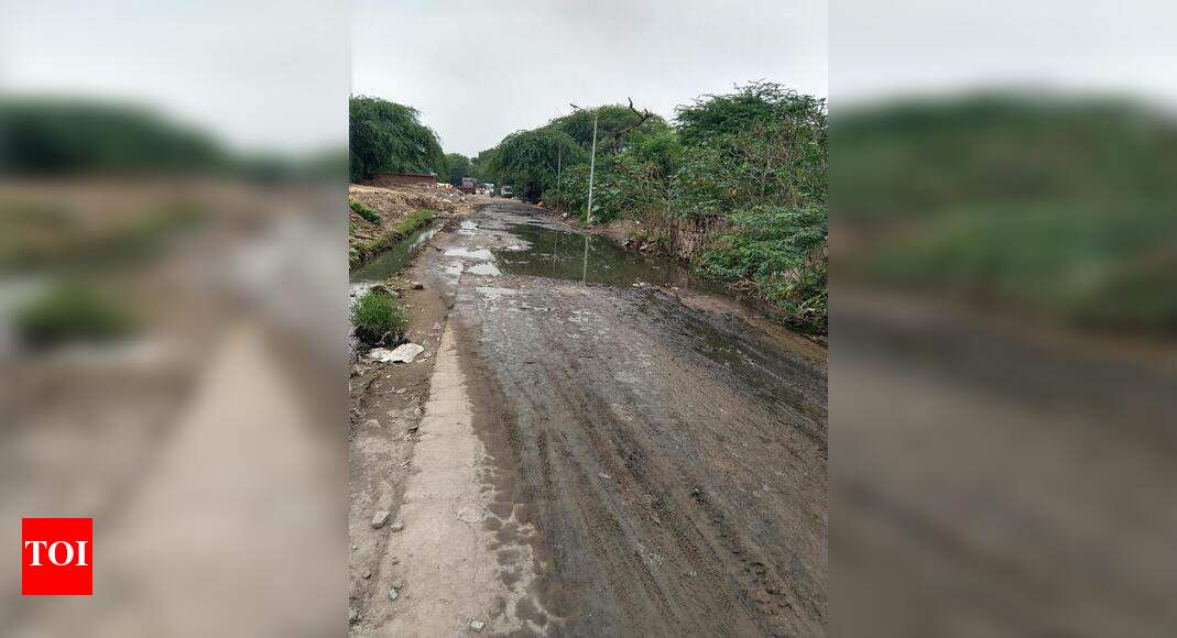 Broken and unmaintained road - Times of India