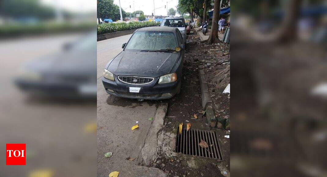 Discarded Car occupying public space - Times of India