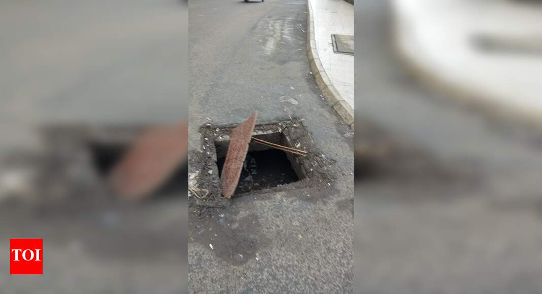 open nallah on road and near school - Times of India