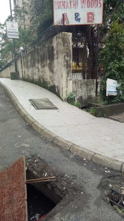 open nallah on road and near school - Times of India