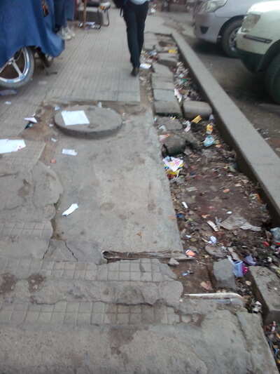 Broken footpath - Times of India