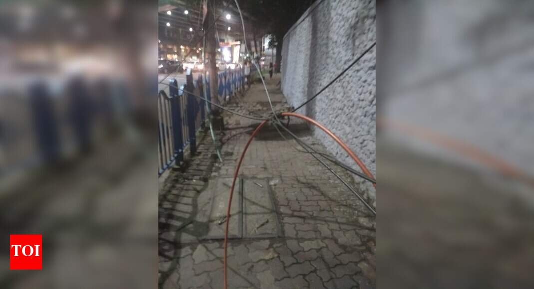 cable wires hanging - Times of India