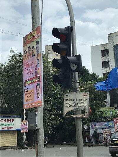 hoarding blocking traffic signal - Times of India