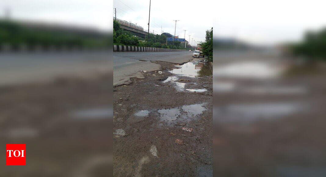 Broken road - Times of India