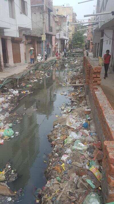 Stinky open drain - Times of India