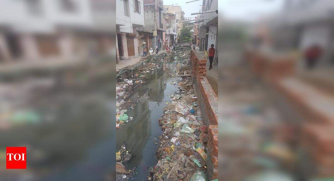 Stinky open drain - Times of India