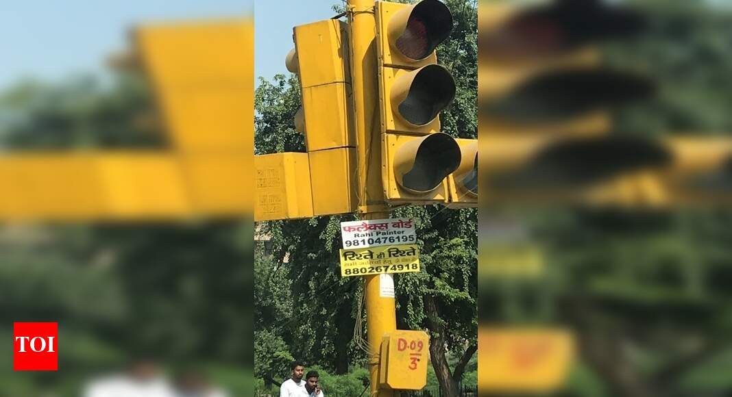 Traffic signal used for ads - Times of India