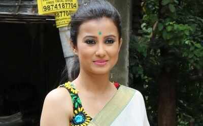 It's a busy Puja for Monami - Times of India