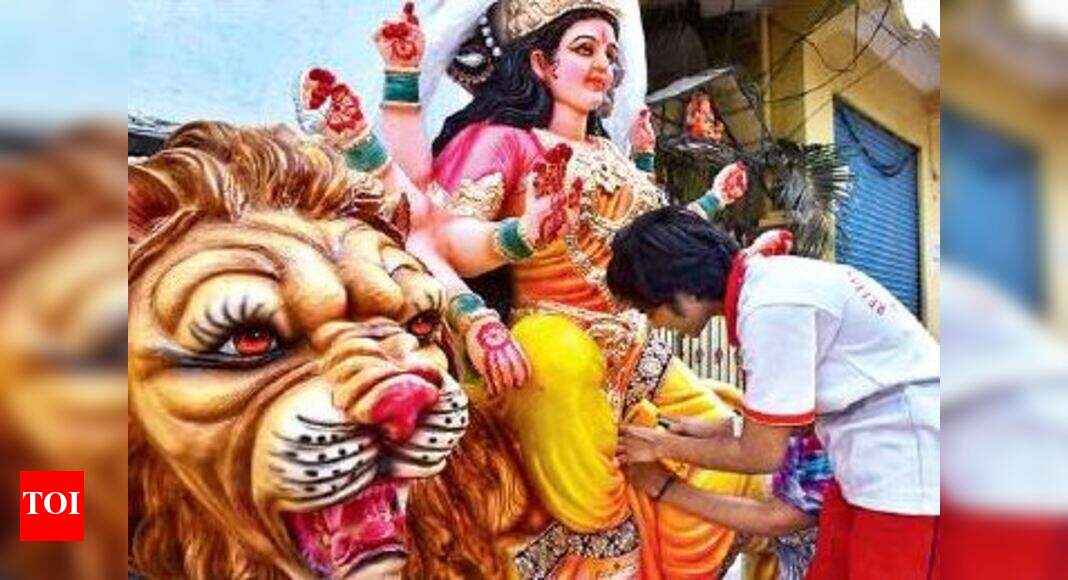 In Durga Puja run-up, artisans from Kolkata add sheen to city ...