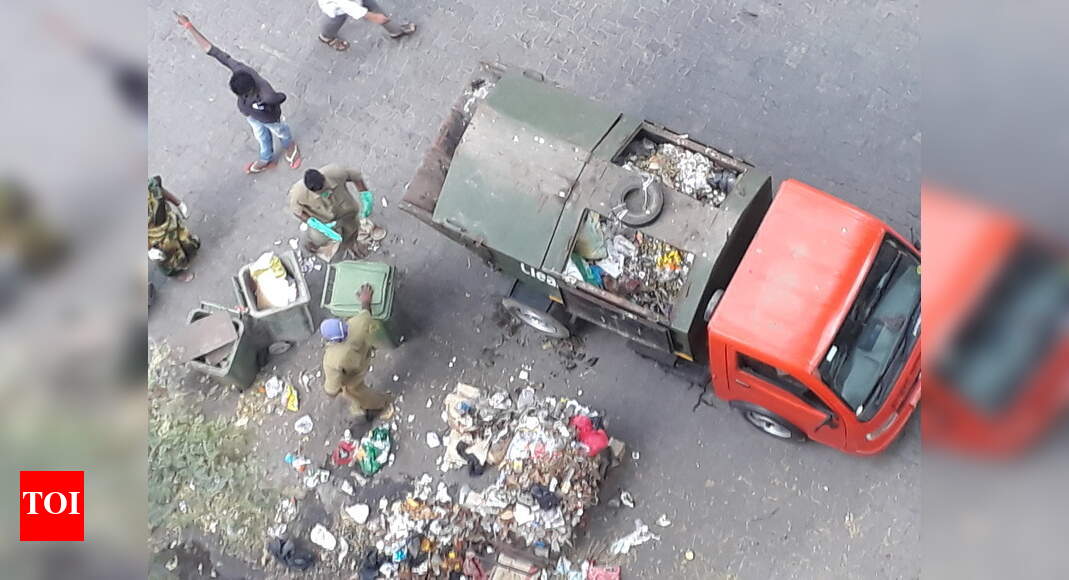 BMC workers are not clearing garbage outside the s - Times of India