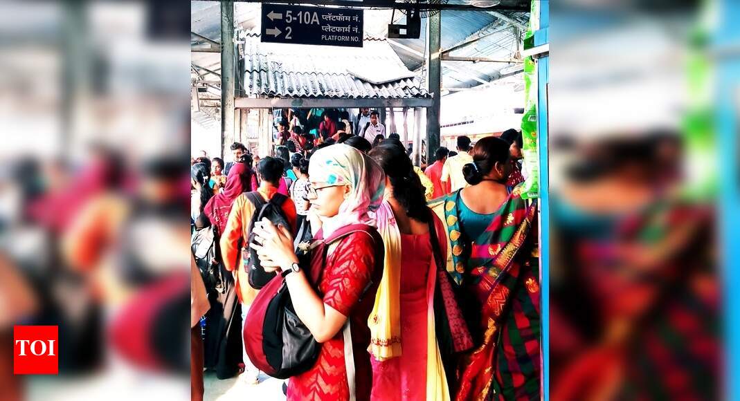 NARROW CROWDED BRIDGE - Times of India