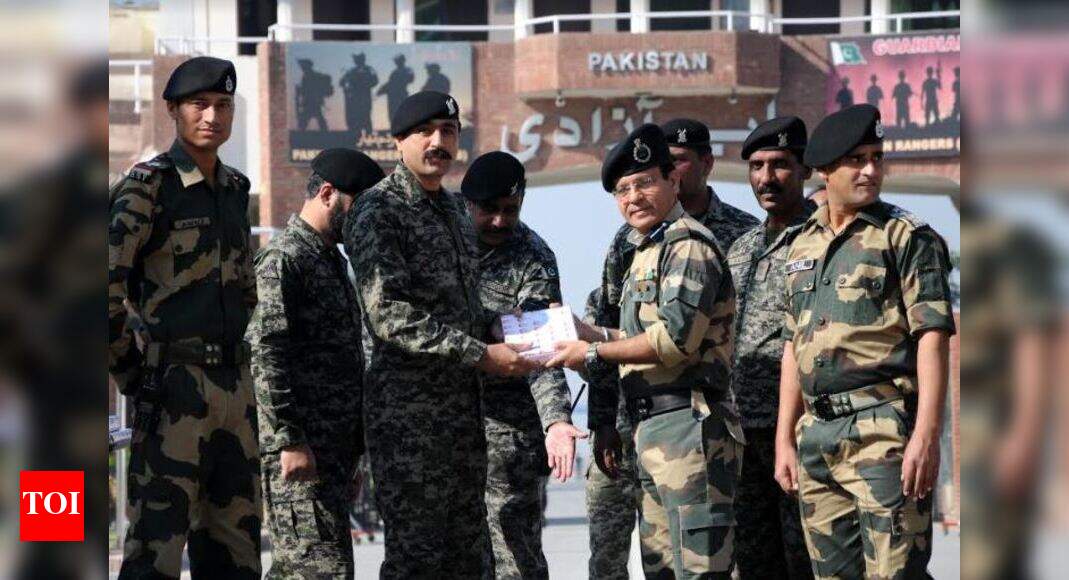 BSF, Pakistan Rangers exchange sweets at border on Diwali | India News ...
