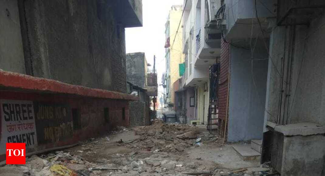 Broken road for past year - Times of India