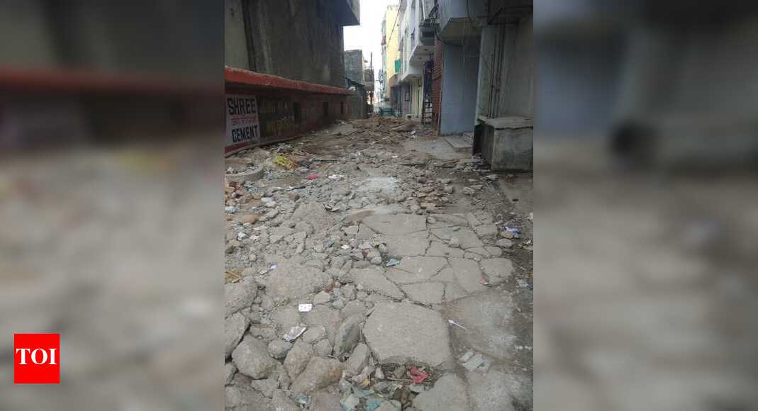 Broken road for past year - Times of India