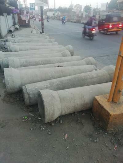 concrete pipes on footpath - Times of India