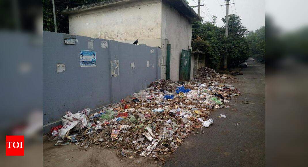 Trash piles up - Times of India