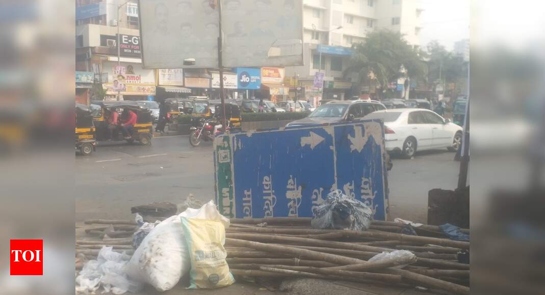 dismantle sign board - Times of India
