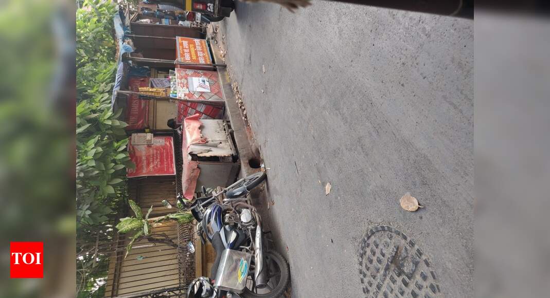 Shops on footpaths - Times of India