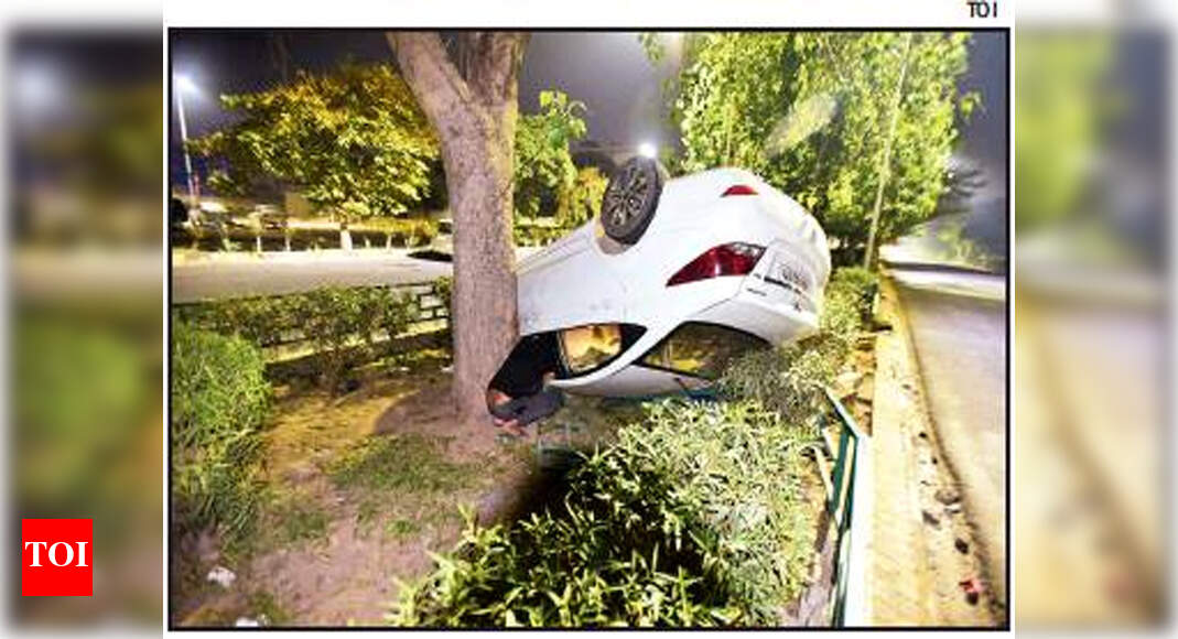 Two Escape Unhurt As Their Car Turns Turtle: Two escape unhurt as their ...