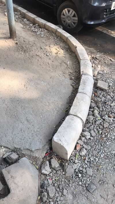 Footpath repair incomplete - Times of India