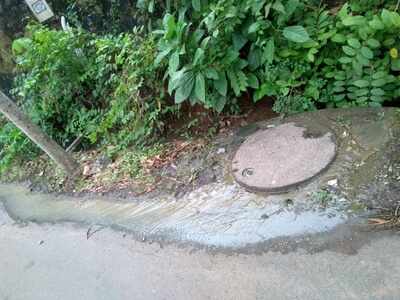 Overflowing Sewage Manhole. - Times of India