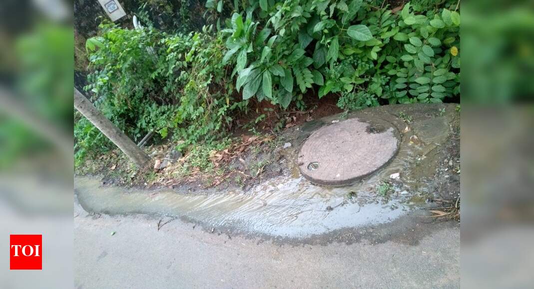 Overflowing Sewage Manhole. - Times of India
