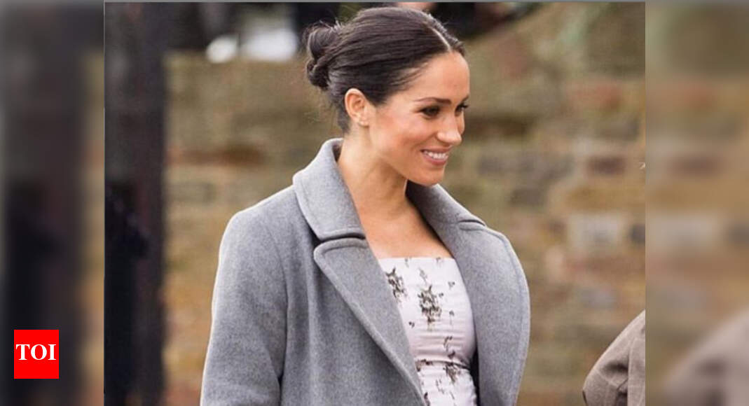 See how Meghan Markle flaunts her baby bump with elegance! - Times of India