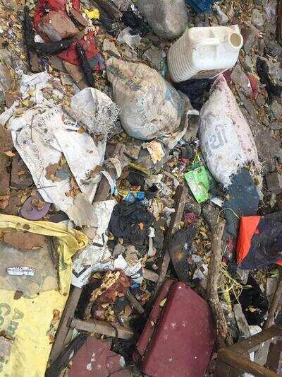 DUMPING GARBAGE NEXT TO CHURCH - Times of India