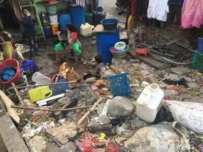 DUMPING GARBAGE NEXT TO CHURCH - Times of India