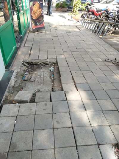 Footpath damaged since many years without repairs - Times of India