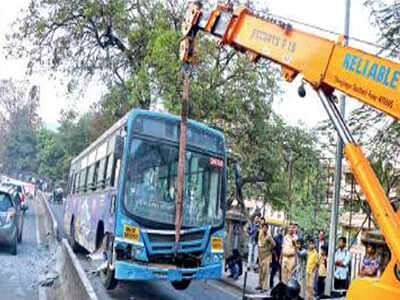 PMPML bus with 30 on board hits divider | Pune News - Times of India