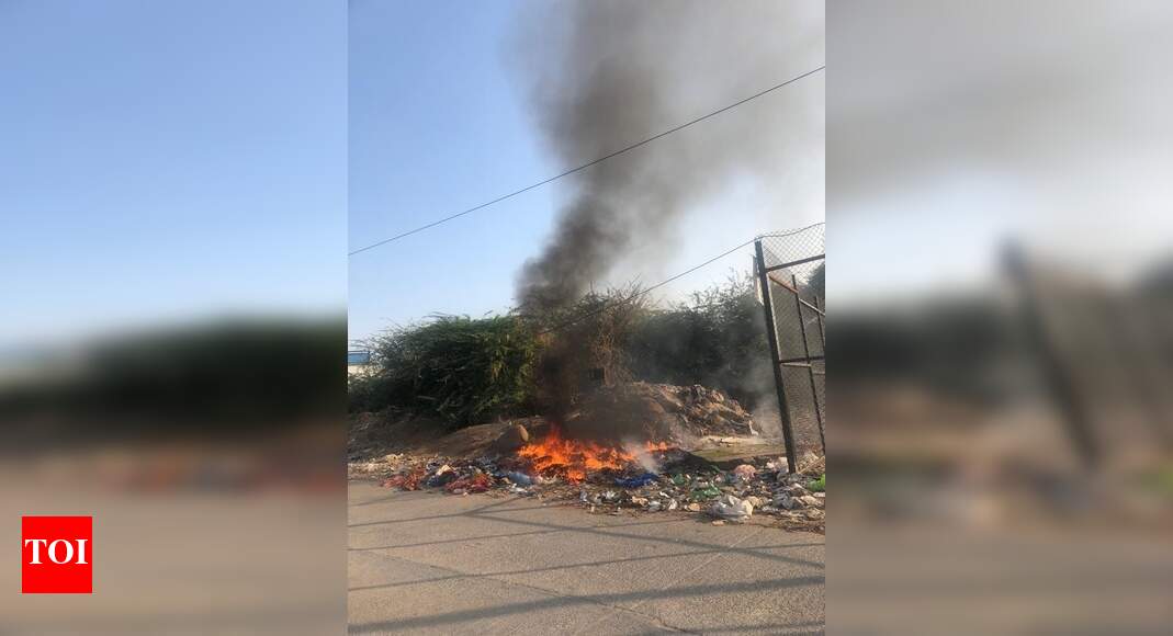 Waste being burnt in open air - Times of India