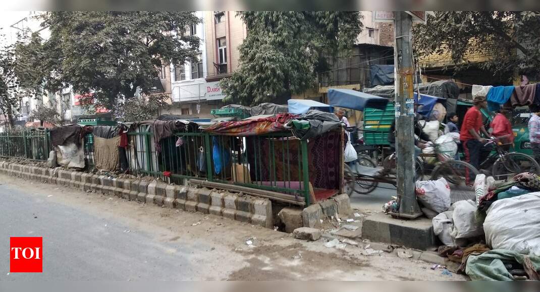 Homeless on central verge - Times of India
