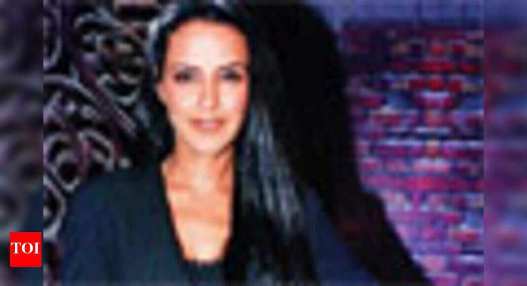 Neha gets formal... | Events Movie News - Times of India