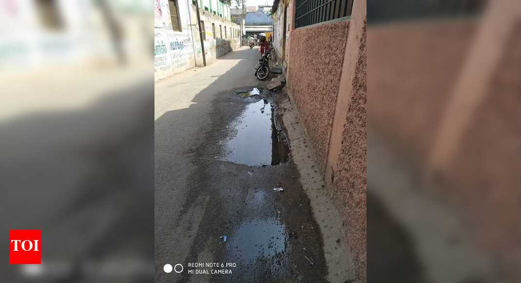 Water Leaking causes road damage - Times of India