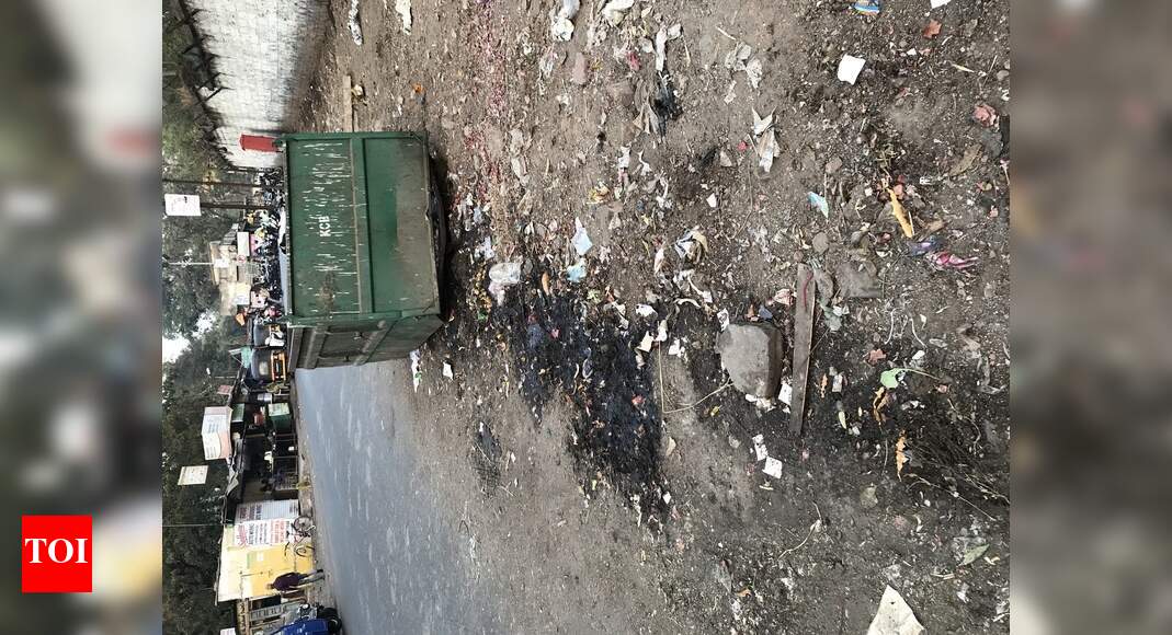 Garbage in front of Church - Times of India