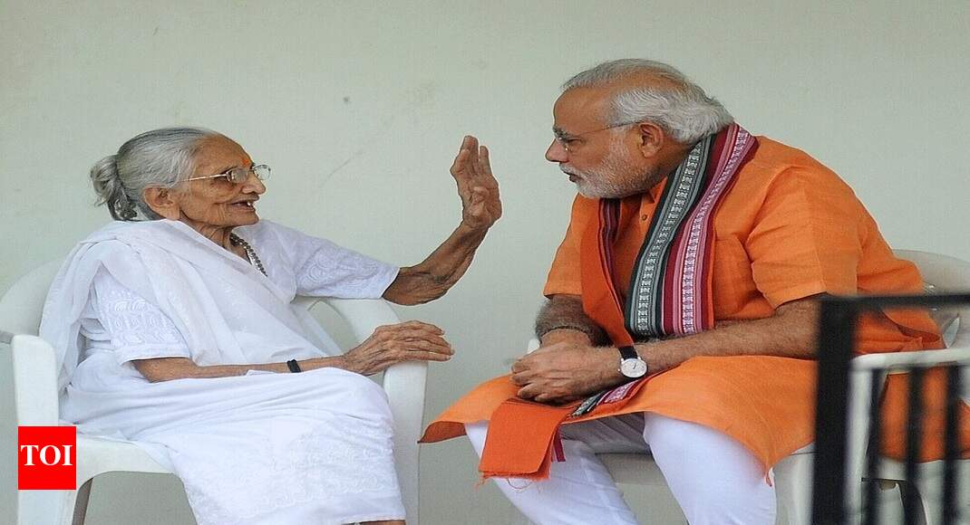 PM Modi meets his mother during Gujarat tour | Ahmedabad News - Times ...