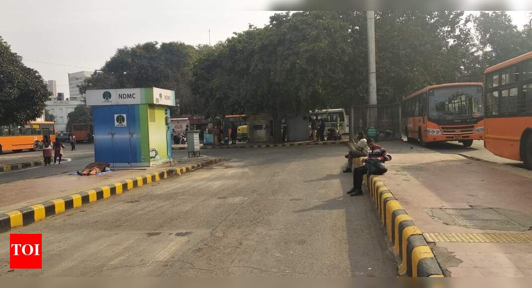 Shelterless bus terminal without benches - Times of India