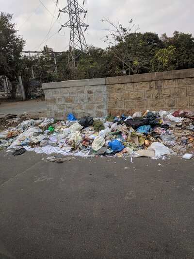 Public place become a garbage dumping yard - Times of India