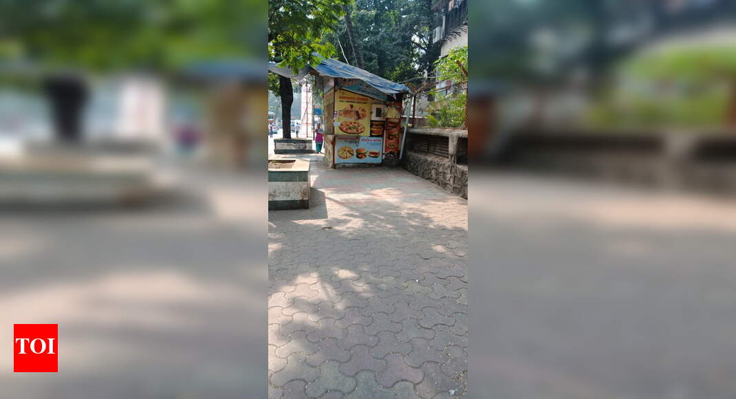 PERMANENT FOOD STALL ON FOOTPATH - The Times of India