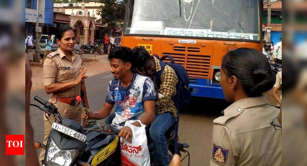 Woman SI hands rose to young helmetless riders; wins internet ...