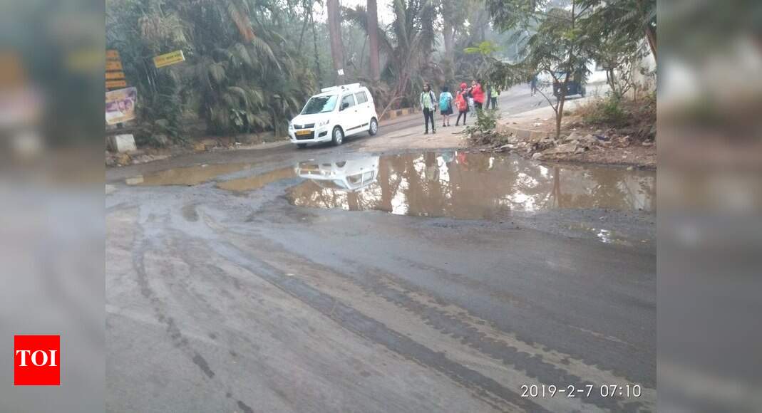 TMC water overflowing on road - Times of India