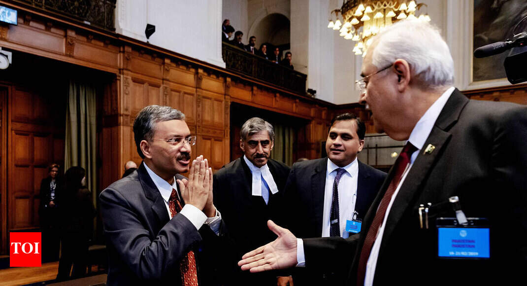 Indian diplomats ignore handshake by Pak officials at ICJ | India News ...