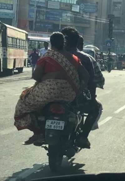 triple riding with no helmet - Times of India