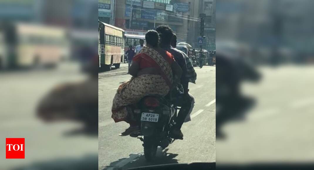 triple riding with no helmet - Times of India