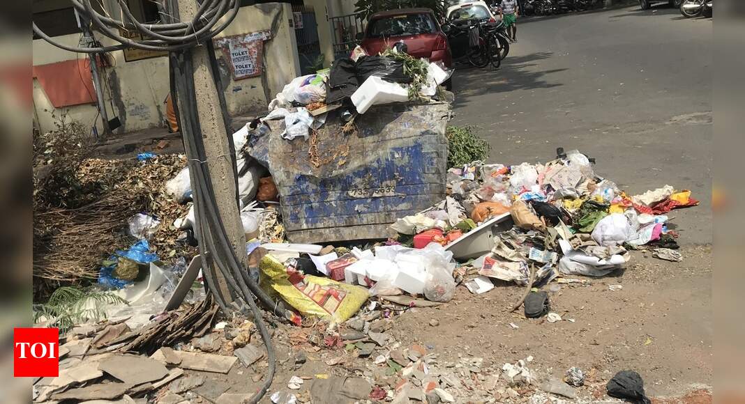 Broken dustbin with garbage all over - Times of India