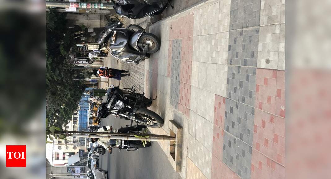 Parked on footpath-Irrum Manzil - Times of India